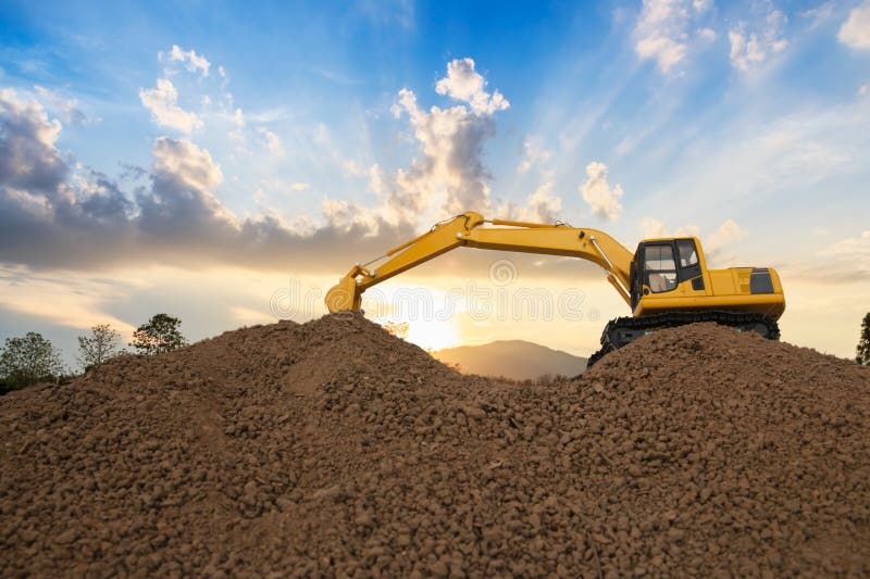 Crawler Excavators are Digging Soil at Construction Site and Laying ...