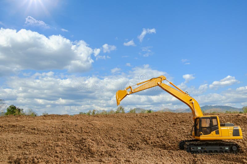 Crawler Excavators are Digging the Soil in the Construction Site. Stock ...