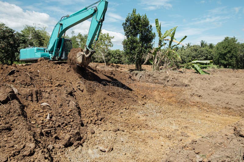Crawler Excavators are Digging the Soil ,dig a Pond. Stock Image ...