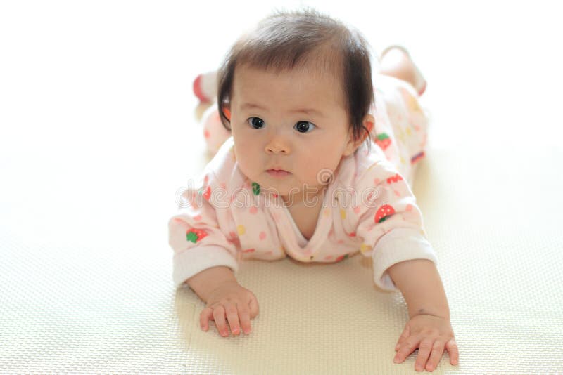 Crawling baby girl stock image. Image of people, crawling - 51992165