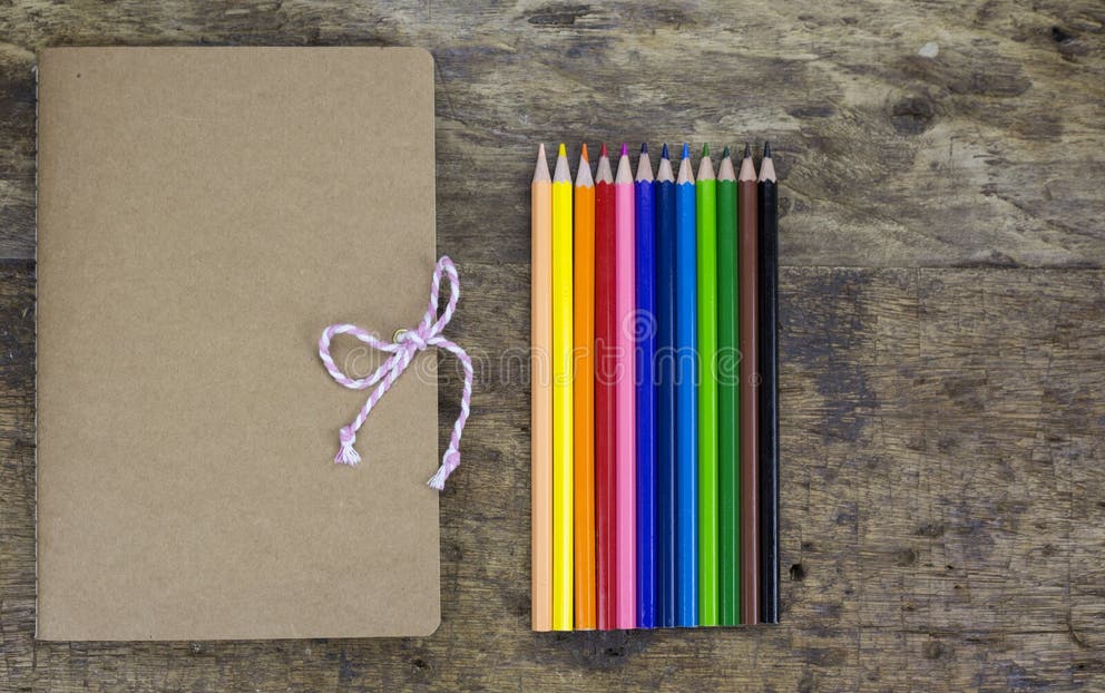 Crayons and notebooks stock photo. Image of colour, pupil - 73121814