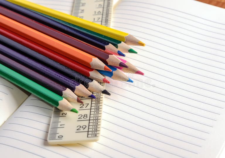 Crayons, a Ruler and Notepad Closeup Stock Image - Image of dividers ...