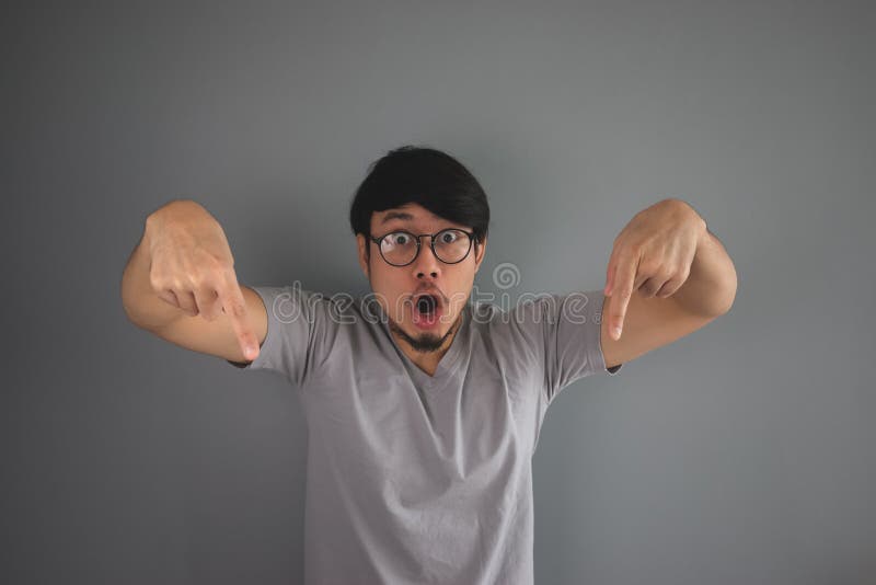 Crazy Asian Man Is Pointing Down. Stock Photo - Image of asian, funny ...
