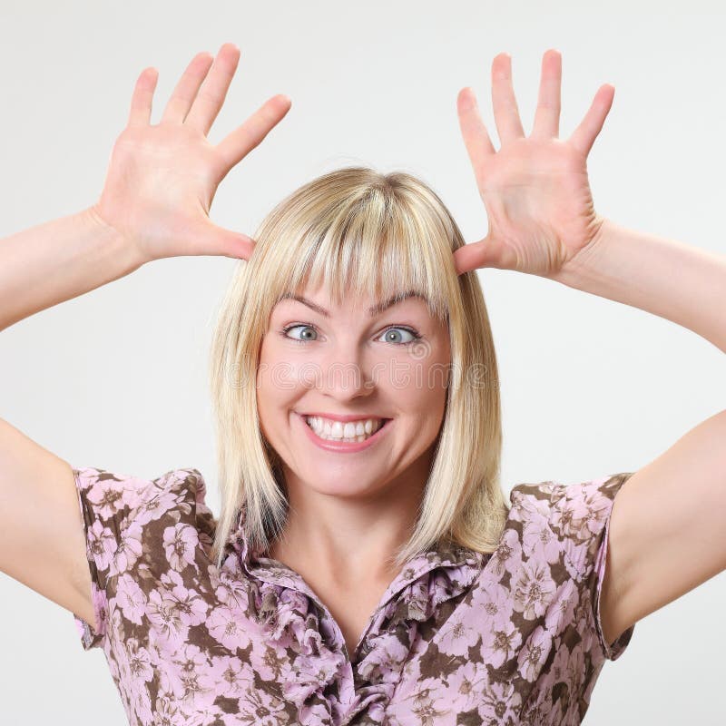 Crazy Young Blonde Woman Makes Squint for Fun Stock Photo - Image of ...