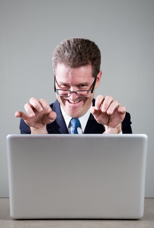 Crazy Businessman on Laptop Computer Stock Image - Image of suit ...
