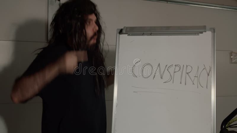 Crazy Conspiracy Guy with a Whiteboard Ranting Stock Footage - Video of ...