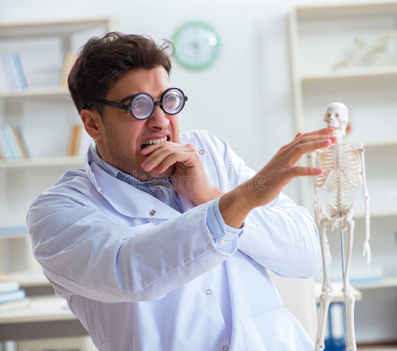 Crazy Doctor Studying Human Skeleton Stock Photo - Image of body ...