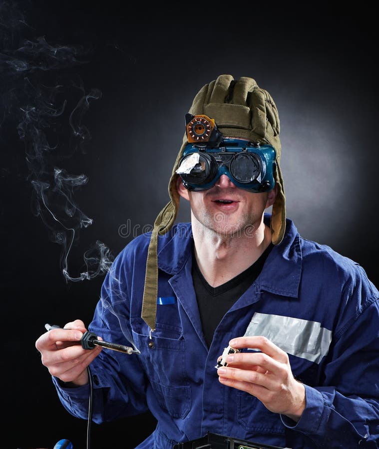 Crazy Genious Witth Soldering Iron Stock Photo - Image of hand ...
