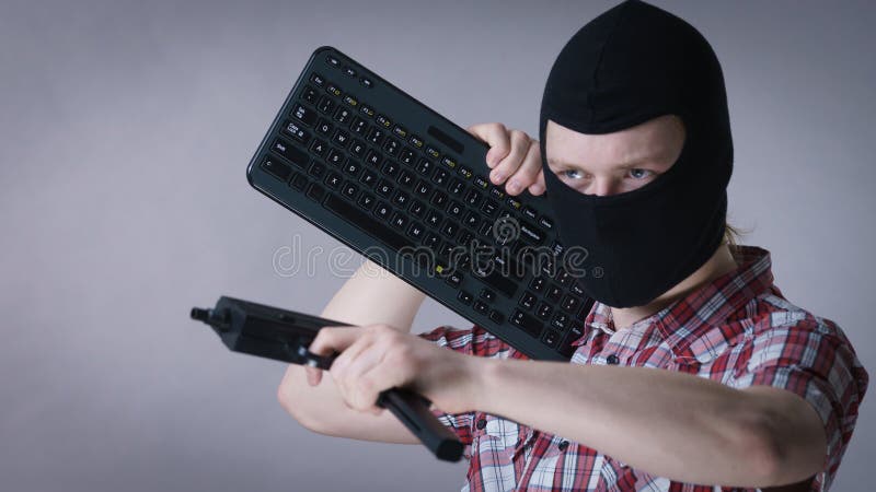 Man in Balaclava Holding Keyboard and Gun Stock Image - Image of ...
