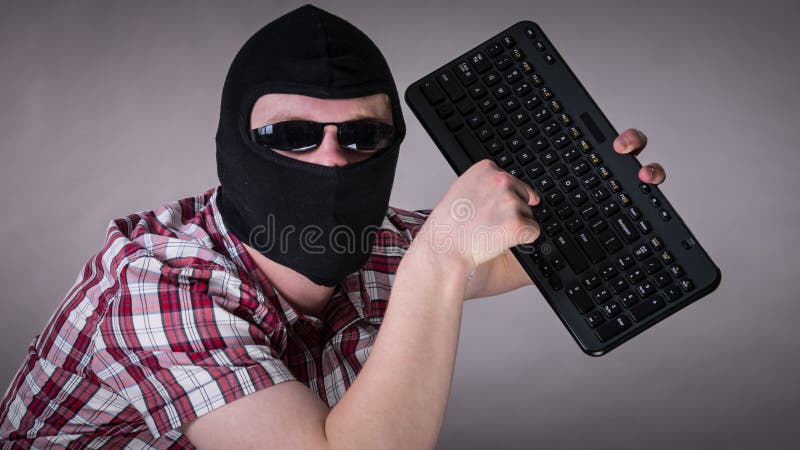 Man Wearing Balaclava Holding Keyboard Stock Image - Image of furious ...