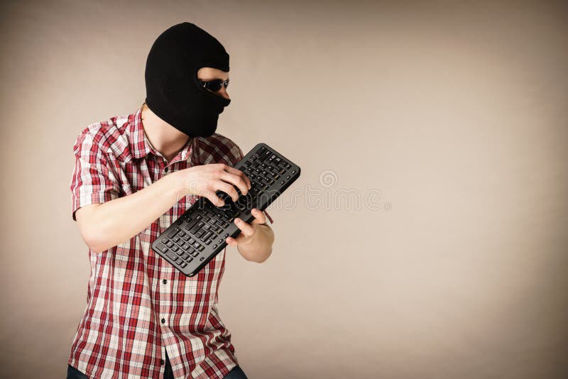 Man Wearing Balaclava Holding Keyboard Stock Image - Image of crazy ...