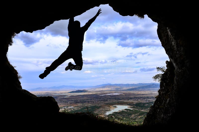 Dynamic Move Climbing in the Cave Editorial Image - Image of cave ...