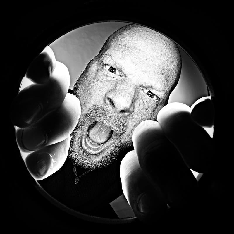 Crazy Mad Man Yelling Down a Hole Stock Photo - Image of dangerous ...