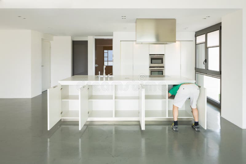Man and kitchen in love stock photo. Image of apartment - 104414546