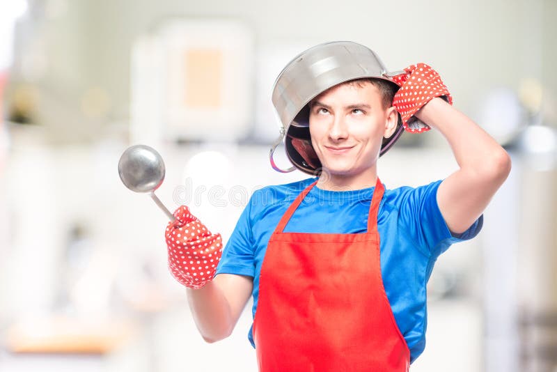 Crazy Man in an Apron with a Pan on His Head Posing Stock Photo - Image ...