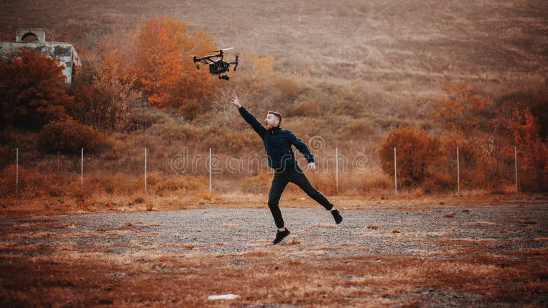 Crazy Man Try To Catch a Drone Stock Photo - Image of crying, mature ...
