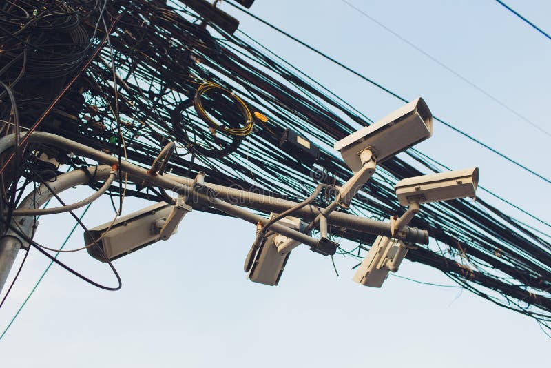 Crazy Messy Chaos Wires Cables on Electric Poles. Stock Image - Image ...