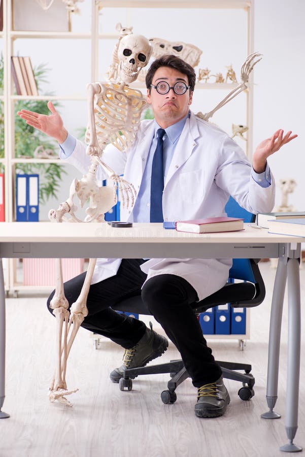 The Crazy Professor Studying Human Skeleton Stock Image - Image of ...