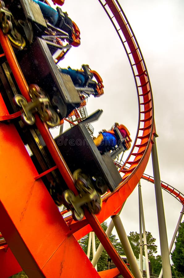 Crazy Rollercoaster Rides at Amusement Park Stock Photo - Image of ...