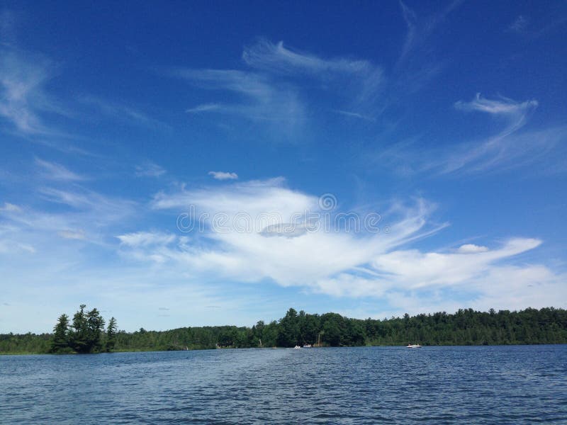 Crazy Sky in Wisconsin stock image. Image of lake, clouds - 59745003