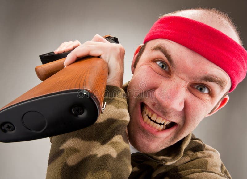 Crazy Soldier with Machine Gun Stock Photo - Image of freak, bizarre ...