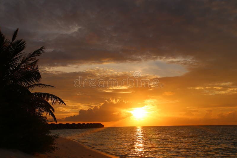 Crazy Sunset on the Maldives. View of the Water Bungalows Stock Photo ...