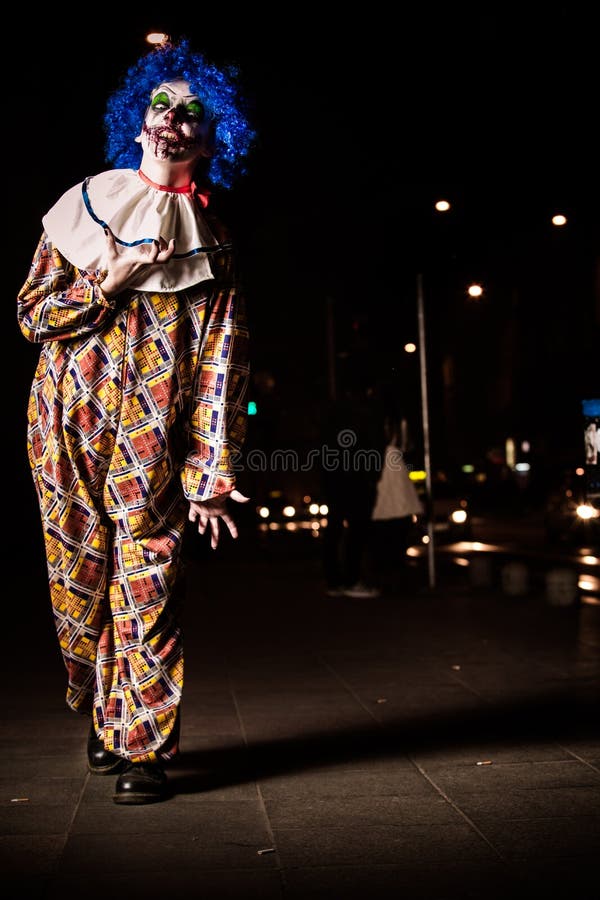 Crazy Ugly Grunge Evil Clown in Town on Halloween Making People Shock ...