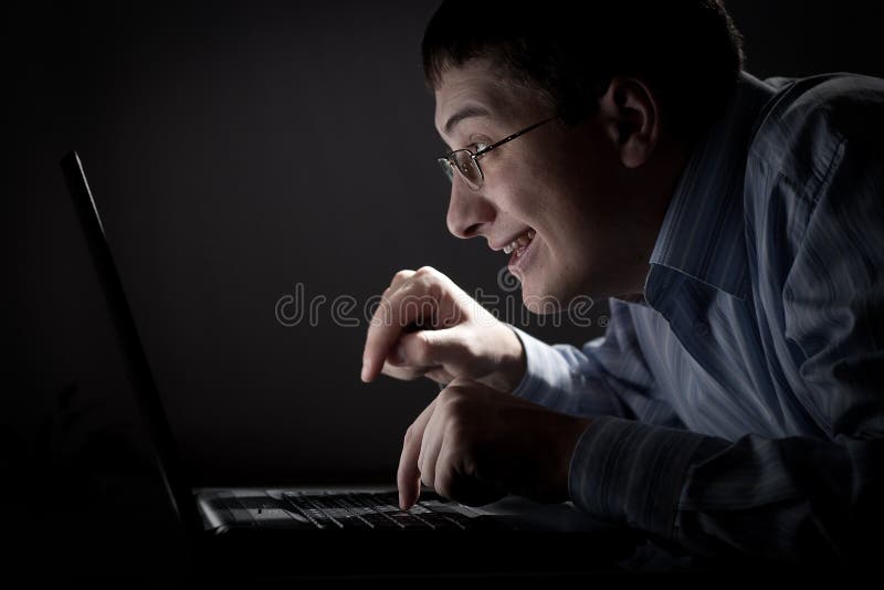 Weird Shocked and Surprised Geek Man in Nerd Glasses Working on Laptop ...