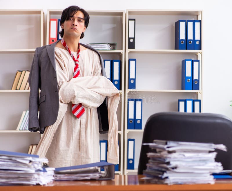 Crazy Young Man in Straitjacket at the Office Stock Image - Image of ...