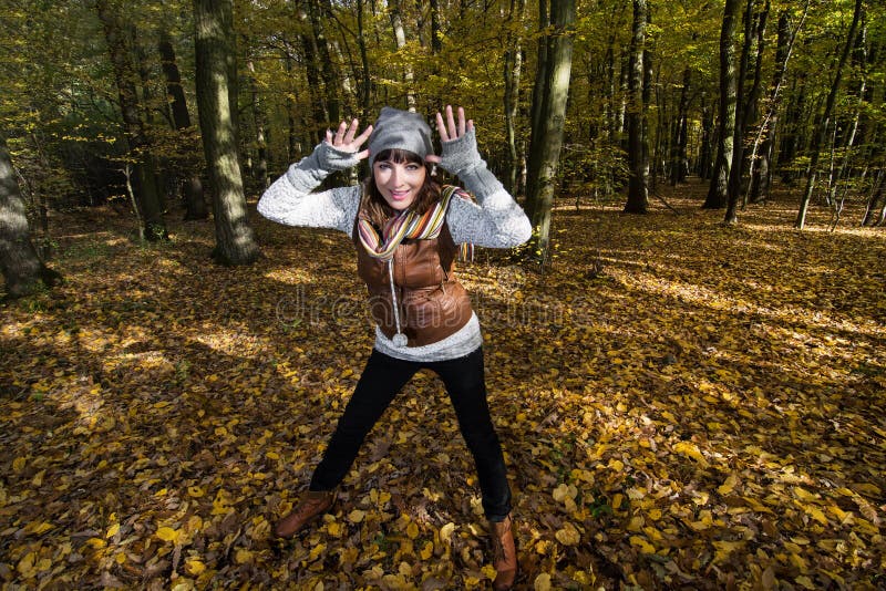 Crazy Young Woman Makes Fun in the Autumn Forest Stock Image - Image of ...