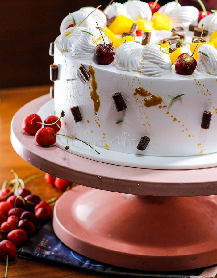 Cream Cake with Cherry on Top and Chocolate Mango Stock Photo - Image ...