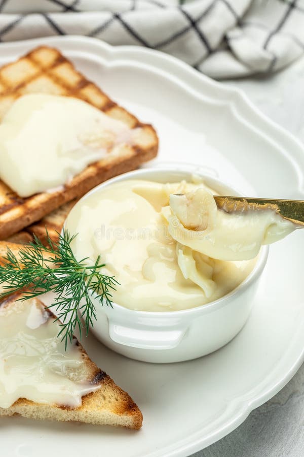 Cream Cheese and Butter for Breakfast. Melted Cheese on Light ...