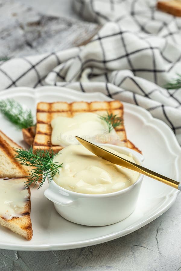 Cream Cheese and Butter for Breakfast. Melted Cheese on Light ...