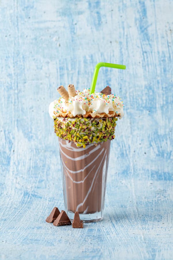 Chocolate Milkshake with Banana on Blue Background Stock Image - Image ...