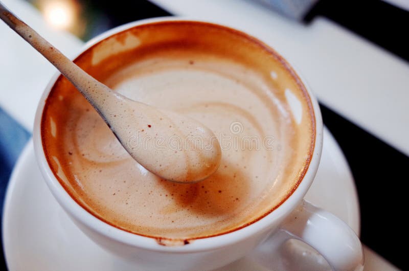 Coffee stir stock photo. Image of coffee, froth, hand - 60284880