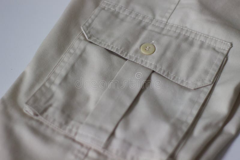 Cream Color Cargo Pants Pocket Stock Photo - Image of cargo, maroon ...