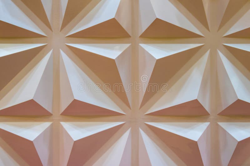 Cream Concrete Wall with a Pattern of Convex Triangles Stock Photo ...