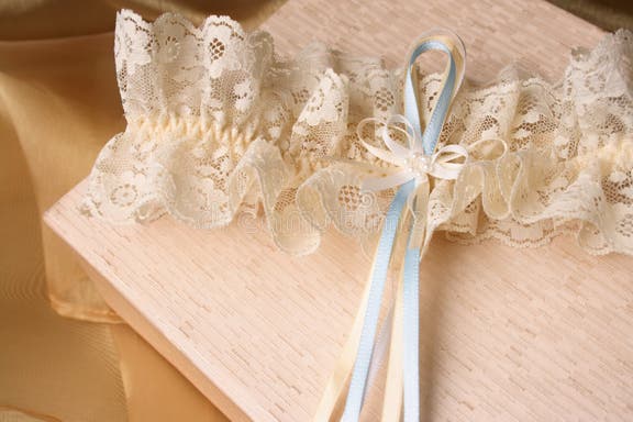 Cream Garter stock photo. Image of ribbon, white, carved - 5557806