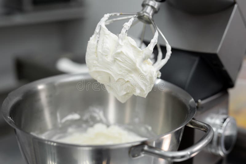 Cream or Meringue on the Corolla of the Kitchen Machine, Mixer Stock ...