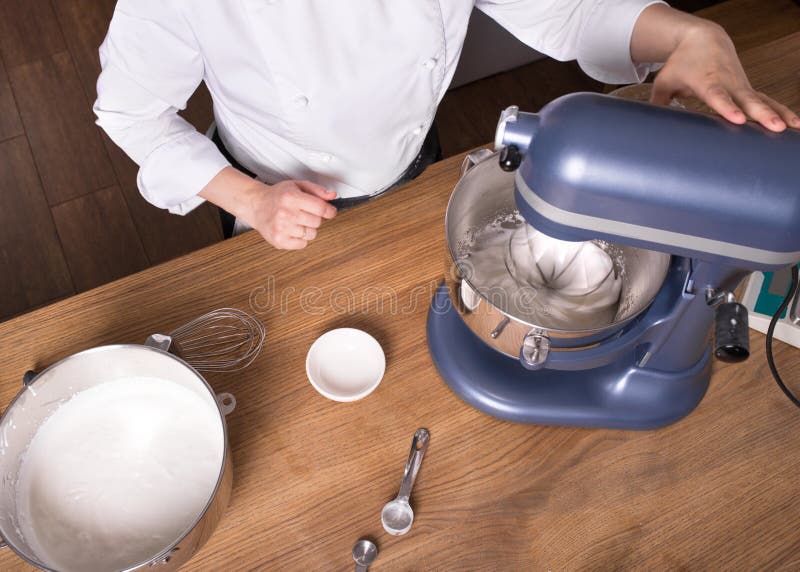 Cream Mixing on Kitchen Table with Kitchenware Stock Photo - Image of ...