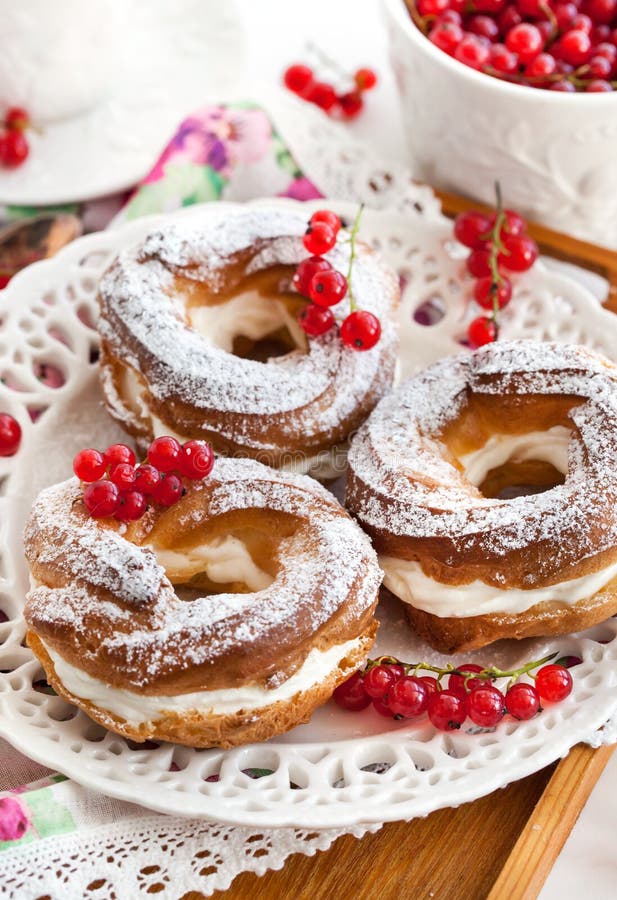 Cream Puff Rings Decorated with Fresh Red Currant Stock Image - Image ...