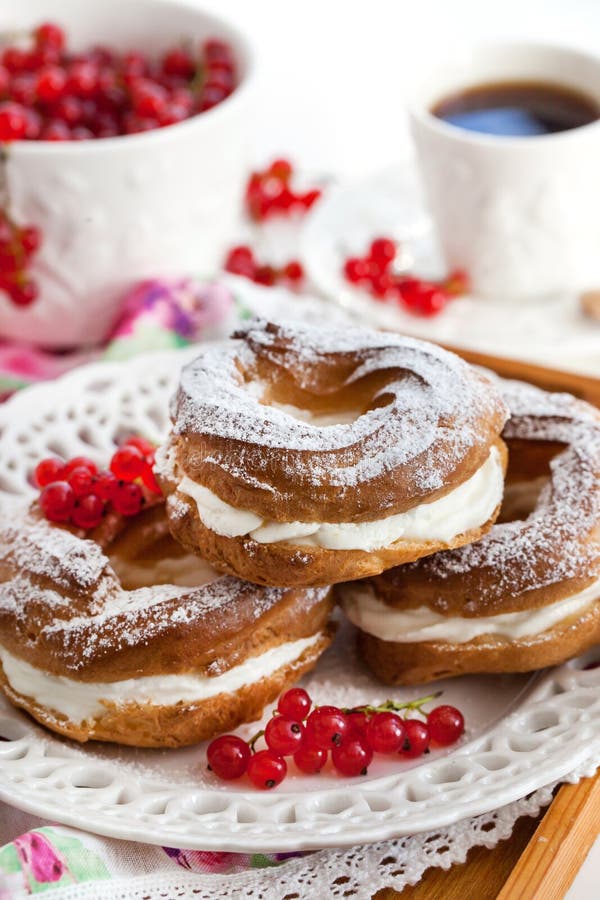 Cream Puff Rings Decorated with Fresh Red Currant Stock Photo - Image ...