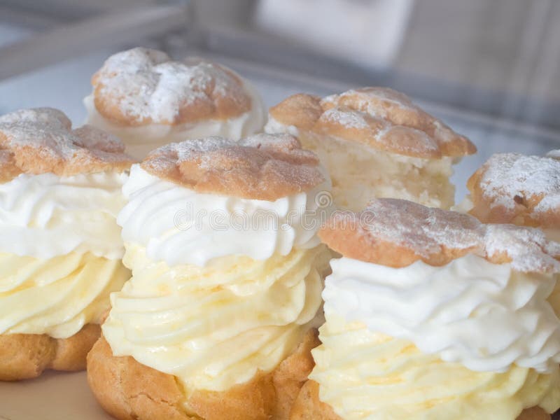 Cream puffs in pastry shop stock photo. Image of gourmet - 8913942