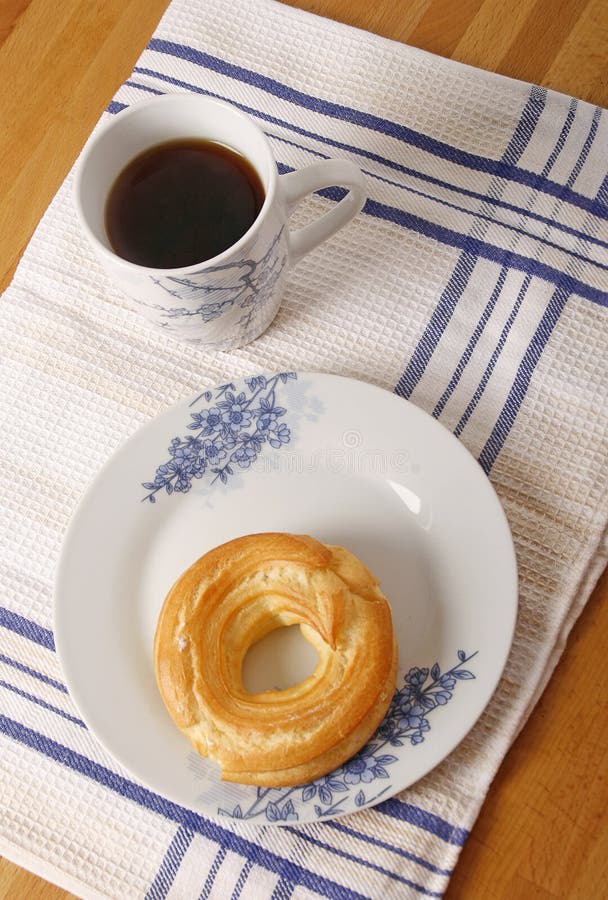 Cream Ring Dessert and Tea Cup Stock Photo - Image of bakery, food ...