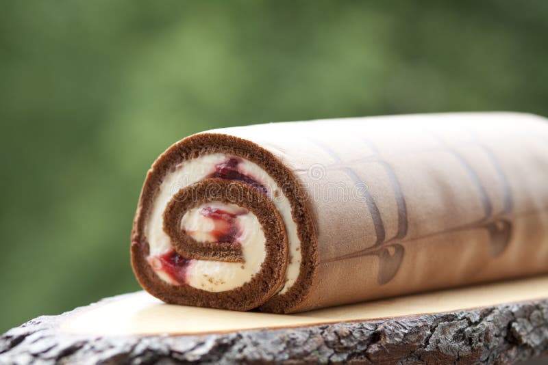 Cream role with cherries stock photo. Image of tasty - 29617276