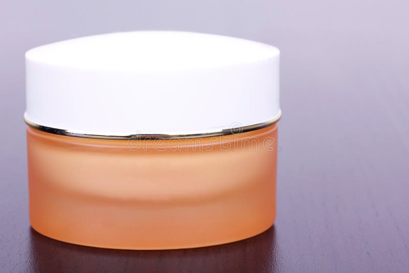 Cream in Yellow Box on Black Table Stock Image - Image of bodylotion ...