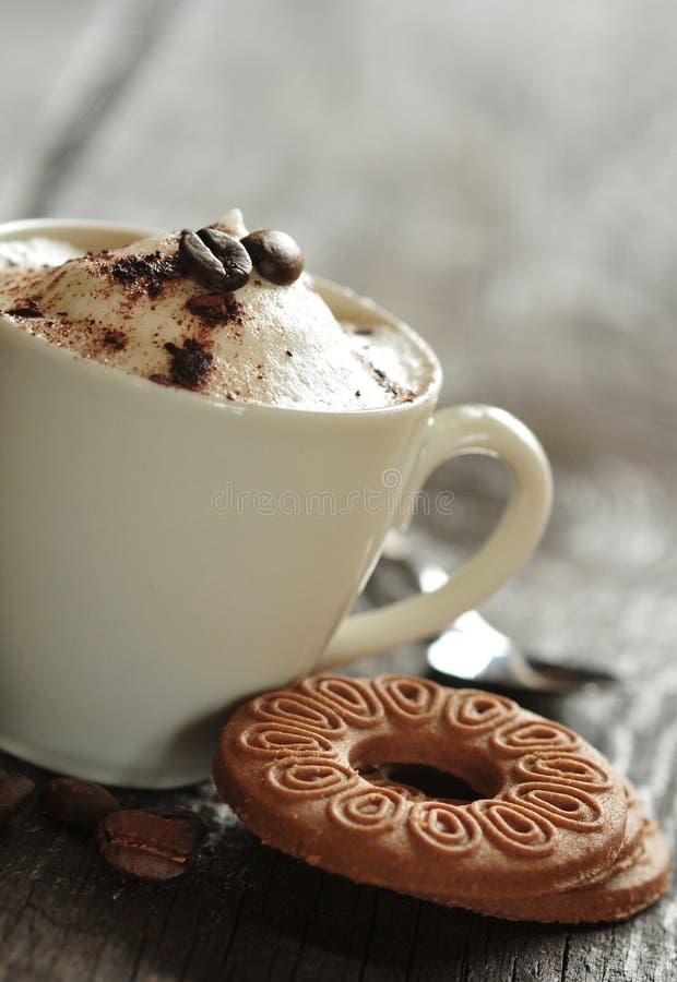 Creamy coffee and cookies stock image. Image of black - 29016539