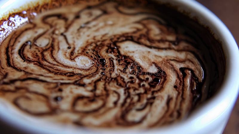 Creamy Coffee Foam Swirling and Forming Intricate, Mesmerizing Patterns ...