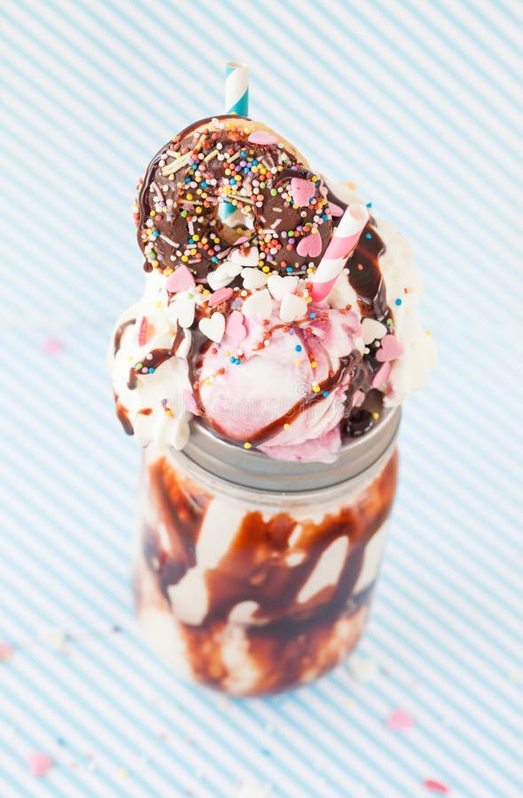 Creamy Overstuffed Milkshake Stock Image - Image of stripes, milkshake ...
