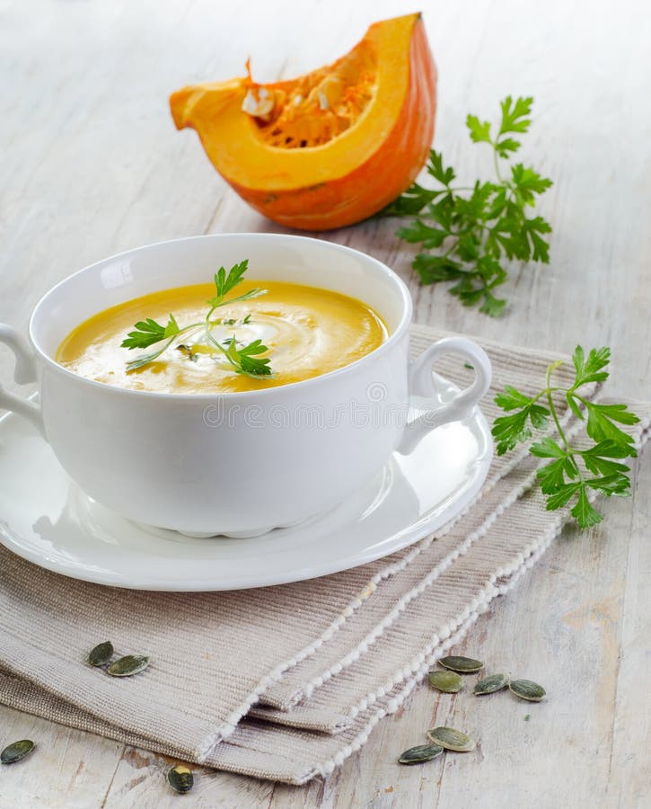 Creamy Pumpkin Soup in a Blue Bowl Close Up Stock Photo - Image of ...